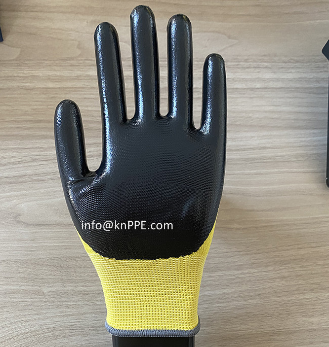 cheap nitrile coated work glove with yellow poly liner and black nitrile smooth anti-acid coating